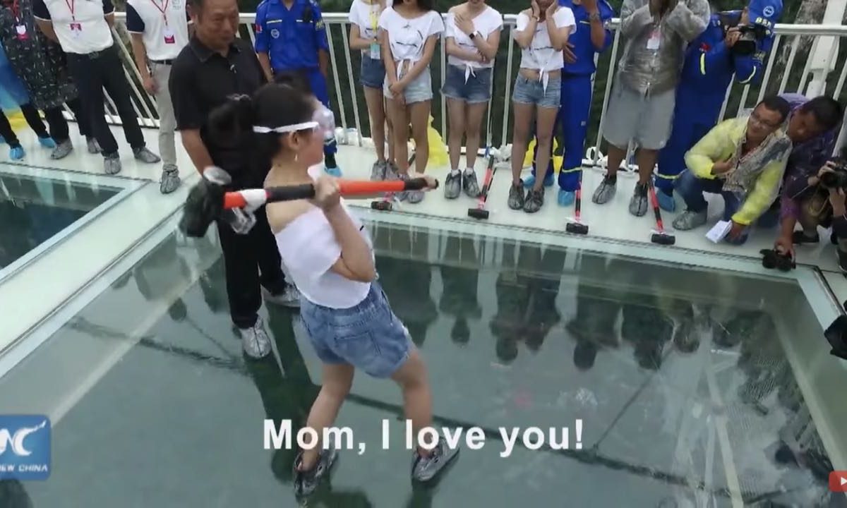 Tourists Are Trying to Break This Glass Bridge in China