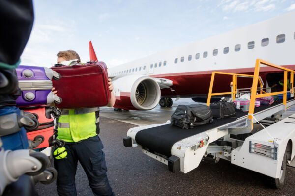How, and Where, Airlines Store Checked Luggage in the Plane's Cargo Hold