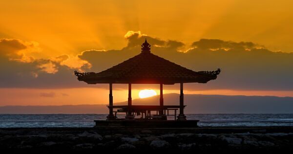 Watch the Sun Set Over Bali's Pantai Cinta Beach