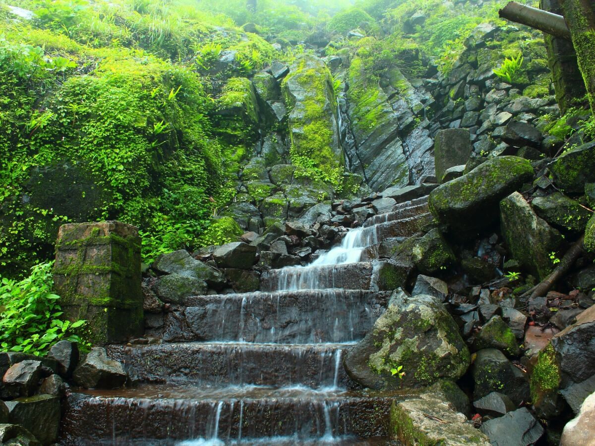 Exploring the Majestic Waterfall Staircase of Korigad Fort
