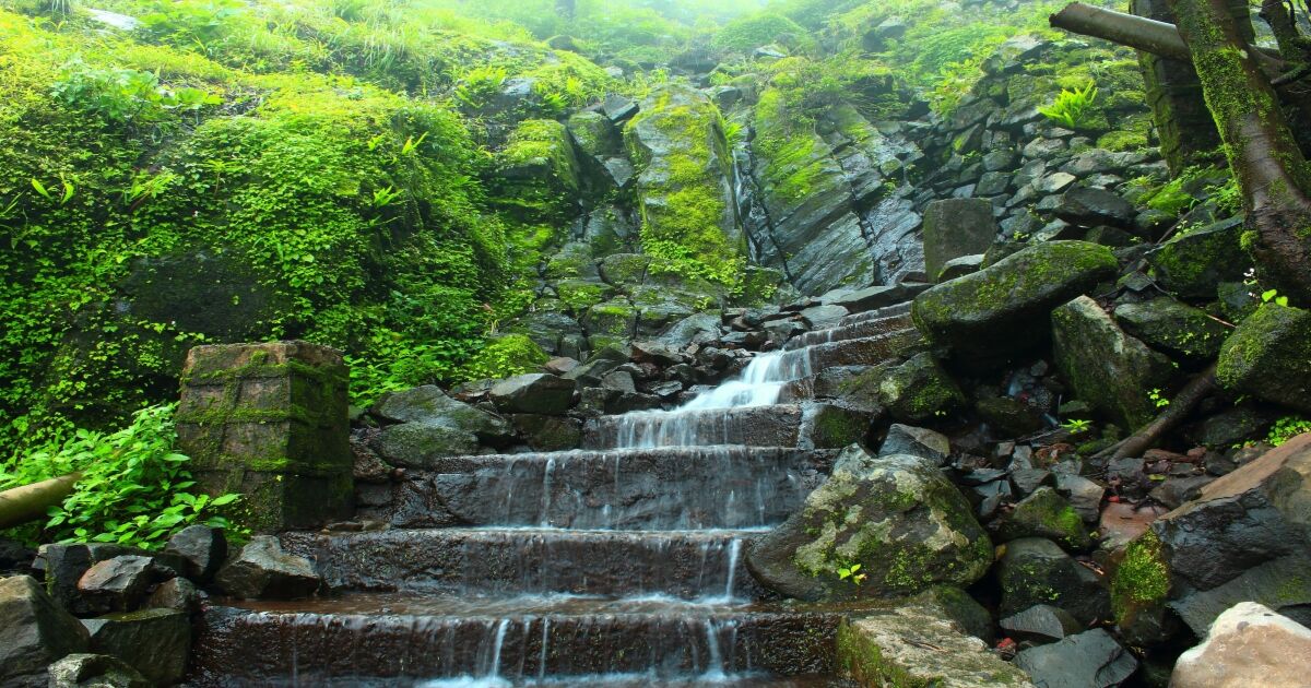 Exploring the Majestic Waterfall Staircase of Korigad Fort