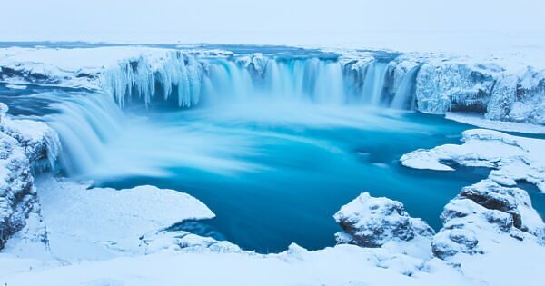 How to Explore the Frozen Waterfalls of Iceland