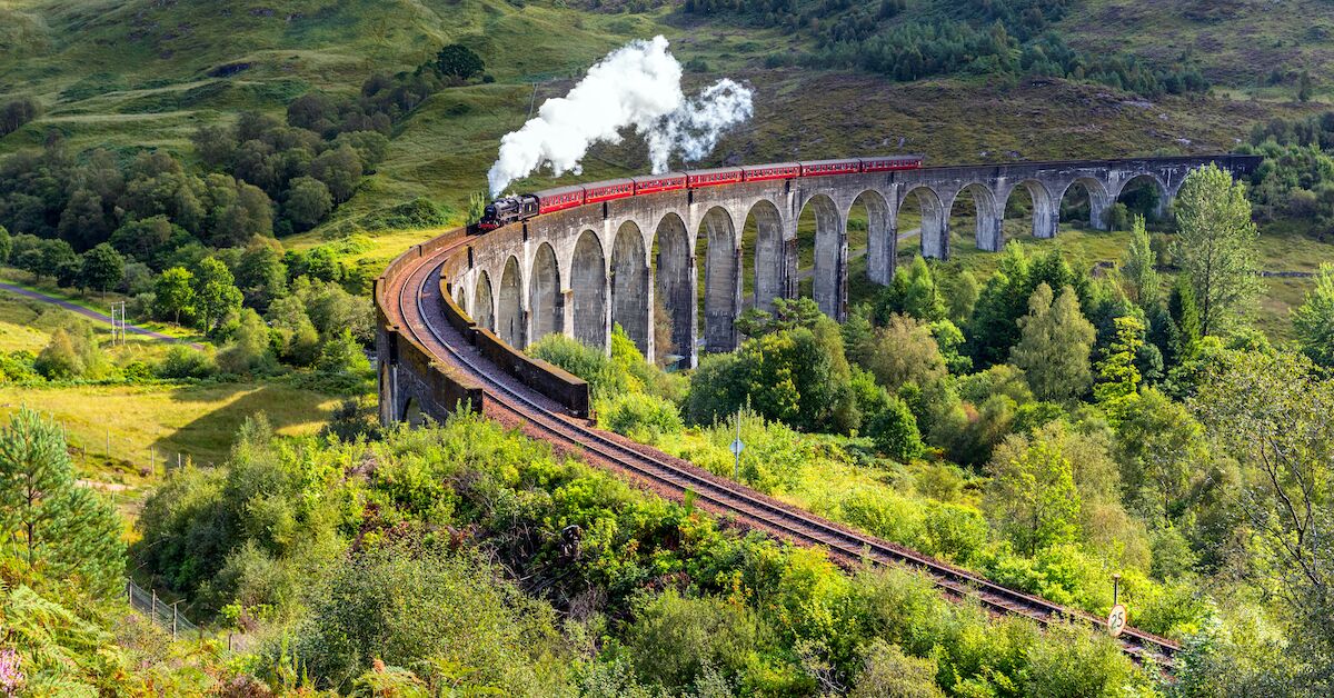 UK Trains Through Scenic Seaside Towns and Mountain Peaks