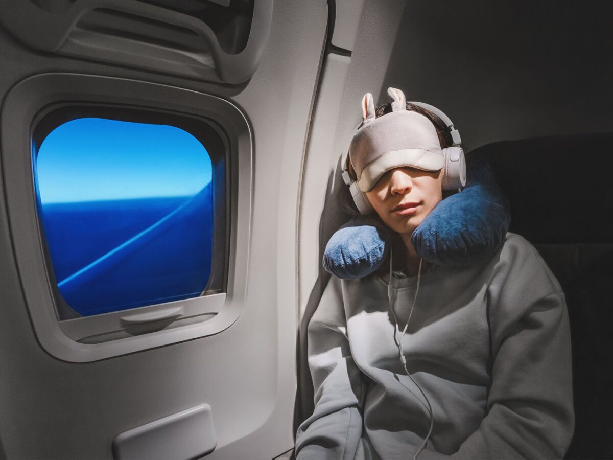 How to Sleep on a Plane, According to Experts and Travelers